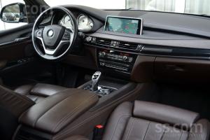 Grey BMW X5 2014 in Tukums, with an engine capacity of 3.00 L and mileage of 249 thousand km for 22490 €, photo 12 on AUTOMOTO.COM.LV