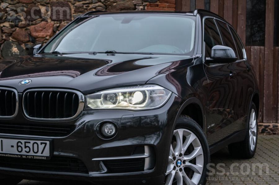 Grey BMW X5 2014 in Tukums, with an engine capacity of 3.00 L and mileage of 201 thousand km for 21500 €, photo 6 on AUTOMOTO.COM.LV