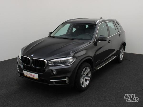 Grey BMW X5 2014 in Vilnius, with an engine capacity of 3.00 L and mileage of 236 thousand km for 19199 €, photo 1 on AUTOMOTO.COM.LV