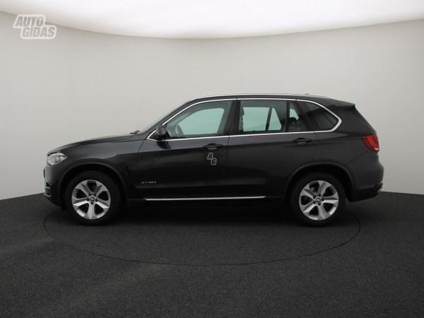 Grey BMW X5 2014 in Vilnius, with an engine capacity of 3.00 L and mileage of 236 thousand km for 19199 €, photo 6 on AUTOMOTO.COM.LV