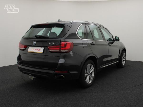 Grey BMW X5 2014 in Vilnius, with an engine capacity of 3.00 L and mileage of 236 thousand km for 19199 €, photo 8 on AUTOMOTO.COM.LV