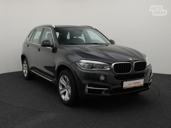 Grey BMW X5 2014 in Vilnius, with an engine capacity of 3.00 L and mileage of 236 thousand km for 19199 €, photo 10 on AUTOMOTO.COM.LV