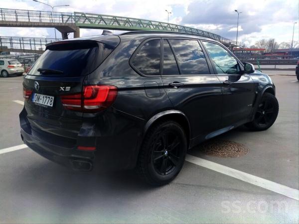 Grey BMW X5 2014 in Riga, with an engine capacity of 3.00 L and mileage of 238 thousand km for 19650 €, photo 2 on AUTOMOTO.COM.LV
