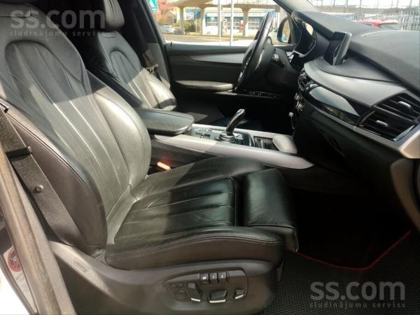 Grey BMW X5 2014 in Riga, with an engine capacity of 3.00 L and mileage of 238 thousand km for 19650 €, photo 10 on AUTOMOTO.COM.LV