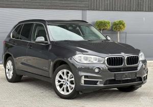 Grey BMW X5 2014 in Siauliai, with an engine capacity of 2.00 L and mileage of 310 thousand km for 17750 €, photo  on AUTOMOTO.COM.LV