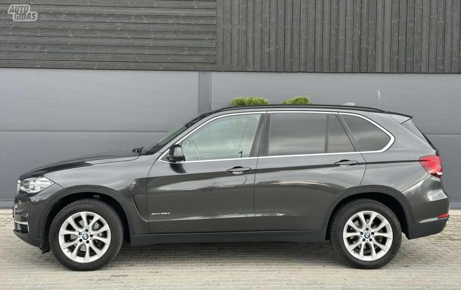 Grey BMW X5 2014 in Siauliai, with an engine capacity of 2.00 L and mileage of 310 thousand km for 17750 €, photo 7 on AUTOMOTO.COM.LV
