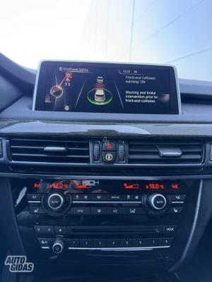 Grey BMW X5 2014 in Siauliai, with an engine capacity of 2.00 L and mileage of 310 thousand km for 17750 €, photo 13 on AUTOMOTO.COM.LV