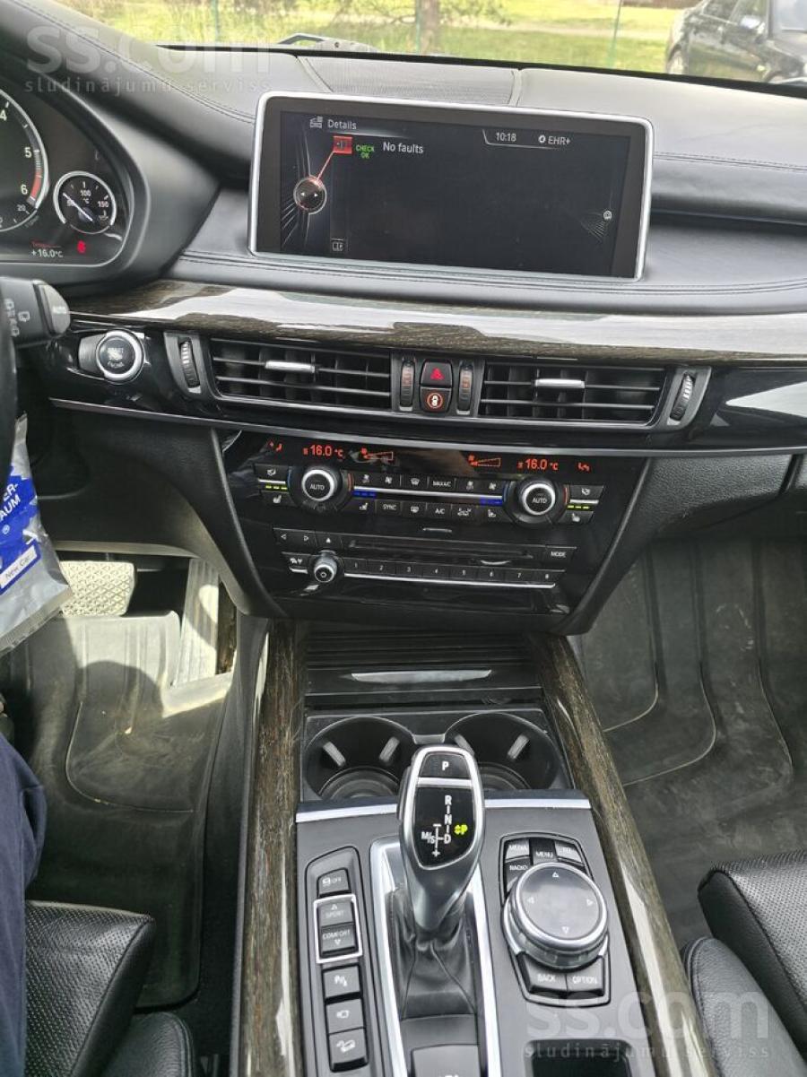 Grey BMW X5 2014 in Jelgava, with an engine capacity of 3.00 L and mileage of 281 thousand km for 17000 €, photo 17 on AUTOMOTO.COM.LV