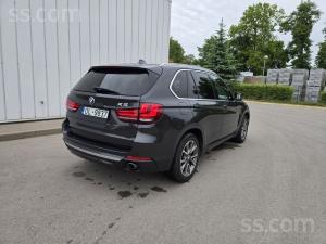 Grey BMW X5 2014 in Jelgava, with an engine capacity of 3.00 L and mileage of 281 thousand km for 17000 €, photo 18 on AUTOMOTO.COM.LV