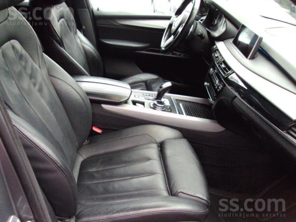 Grey BMW X5 2014 in Riga, with an engine capacity of 3.00 L and mileage of 210 thousand km for 20800 €, photo 7 on AUTOMOTO.COM.LV