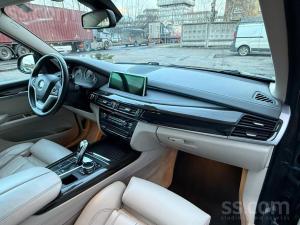 Grey BMW X5 2014 in Riga, with an engine capacity of 3.00 L and mileage of 331 thousand km for 14990 €, photo 14 on AUTOMOTO.COM.LV