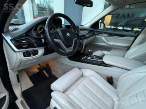 Grey BMW X5 2014 in Riga, with an engine capacity of 3.00 L and mileage of 331 thousand km for 14990 €, photo 28 on AUTOMOTO.COM.LV