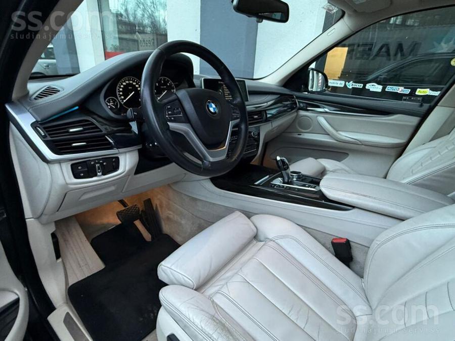 Grey BMW X5 2014 in Riga, with an engine capacity of 3.00 L and mileage of 331 thousand km for 14990 €, photo 28 on AUTOMOTO.COM.LV