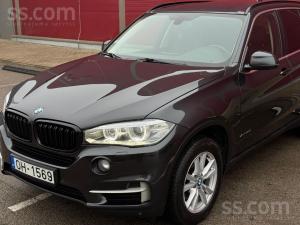 Grey BMW X5 2014 in Jelgava, with an engine capacity of 3.00 L and mileage of 318 thousand km for 17490 €, photo  on AUTOMOTO.COM.LV