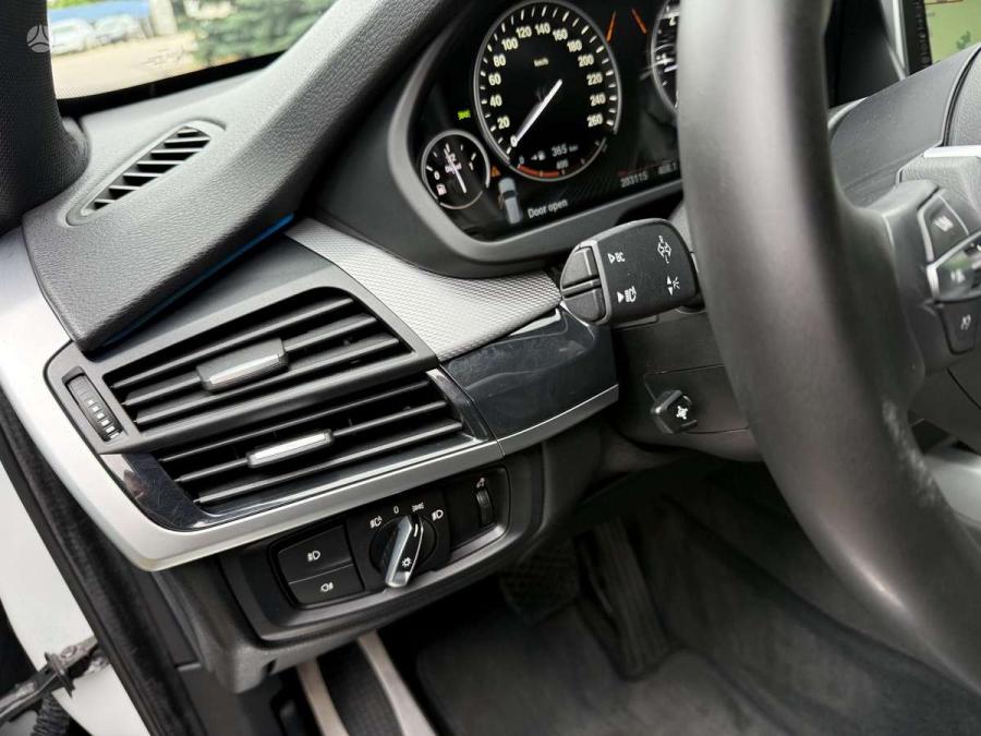 Grey BMW X5 2014 in Utena, with an engine capacity of 2.99 L and mileage of 205 thousand km for 17700 €, photo 17 on AUTOMOTO.COM.LV