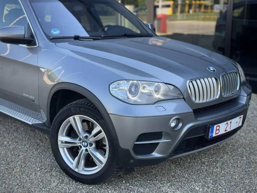 Grey BMW X5 2014 in Jelgava, with an engine capacity of 3.00 L and mileage of 193 thousand km for 12900 €, photo 8 on AUTOMOTO.COM.LV