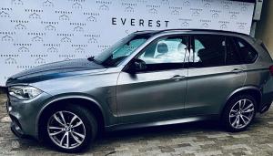 Grey BMW X5 2014 in Kaisiadorys, with an engine capacity of 2.99 L and mileage of 242 thousand km for 19550 €, photo 7 on AUTOMOTO.COM.LV
