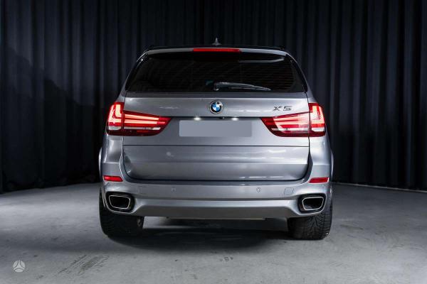 Grey BMW X5 2014 in Vilnius, with an engine capacity of 2.99 L and mileage of 180 thousand km for 24999 €, photo 5 on AUTOMOTO.COM.LV