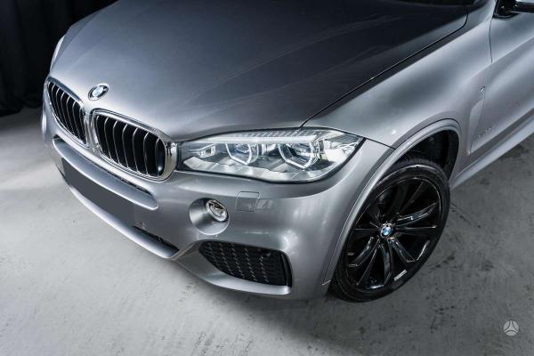 Grey BMW X5 2014 in Vilnius, with an engine capacity of 2.99 L and mileage of 180 thousand km for 24999 €, photo 7 on AUTOMOTO.COM.LV