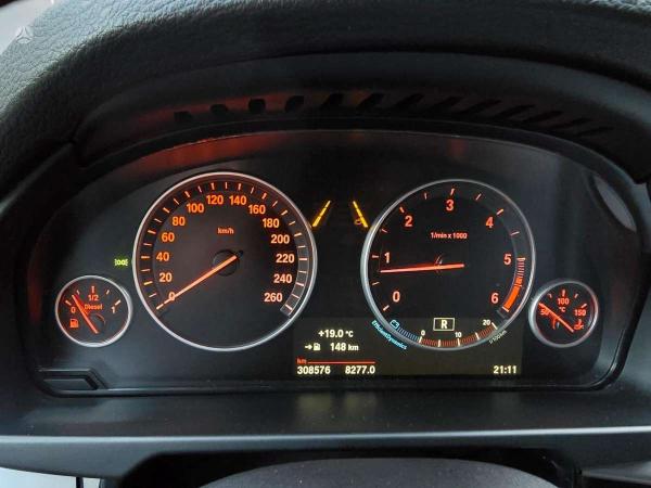 Grey BMW X5 2014 in Utena, with an engine capacity of 2.99 L and mileage of 308 thousand km for 13700 €, photo 7 on AUTOMOTO.COM.LV