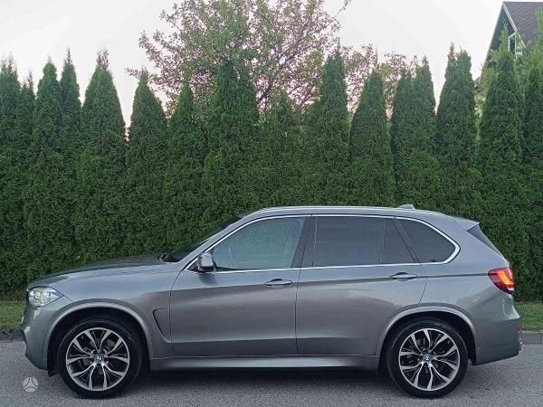 Grey BMW X5 2014 in Vilnius, with an engine capacity of 2.98 L and mileage of 186 thousand km for 14700 €, photo 6 on AUTOMOTO.COM.LV