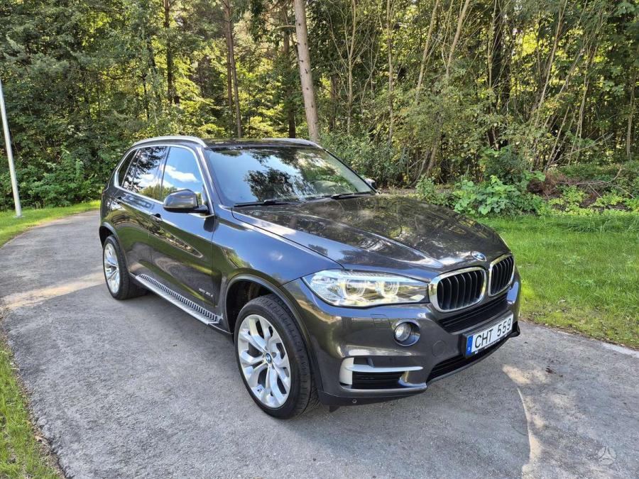 Grey BMW X5 2014 in Utena, with an engine capacity of 2.99 L and mileage of 280 thousand km for 14990 €, photo 1 on AUTOMOTO.COM.LV