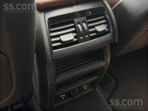 Grey BMW X5 2014 in Riga, with an engine capacity of 3.00 L and mileage of 221 thousand km for 18990 €, photo 21 on AUTOMOTO.COM.LV