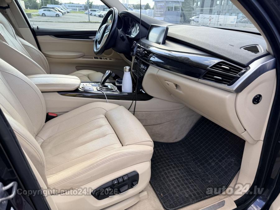 Grey BMW X5 2014 in Tallinn, with an engine capacity of 3.00 L and mileage of 233 thousand km for 23000 €, photo 10 on AUTOMOTO.COM.LV