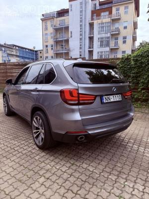 Grey BMW X5 2014 in Riga, with an engine capacity of 3.00 L and mileage of 214 thousand km for 20950 €, photo  on AUTOMOTO.COM.LV