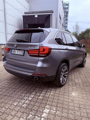 Grey BMW X5 2014 in Riga, with an engine capacity of 3.00 L and mileage of 214 thousand km for 20950 €, photo 3 on AUTOMOTO.COM.LV