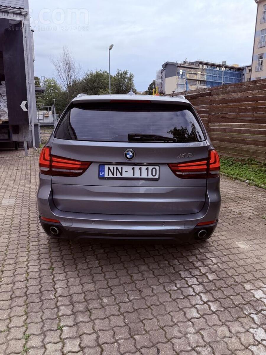 Grey BMW X5 2014 in Riga, with an engine capacity of 3.00 L and mileage of 214 thousand km for 20950 €, photo 7 on AUTOMOTO.COM.LV