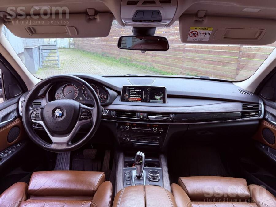 Grey BMW X5 2014 in Riga, with an engine capacity of 3.00 L and mileage of 214 thousand km for 20950 €, photo 10 on AUTOMOTO.COM.LV