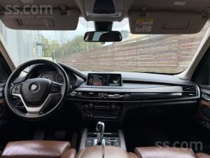 Grey BMW X5 2014 in Riga, with an engine capacity of 3.00 L and mileage of 214 thousand km for 20950 €, photo 12 on AUTOMOTO.COM.LV