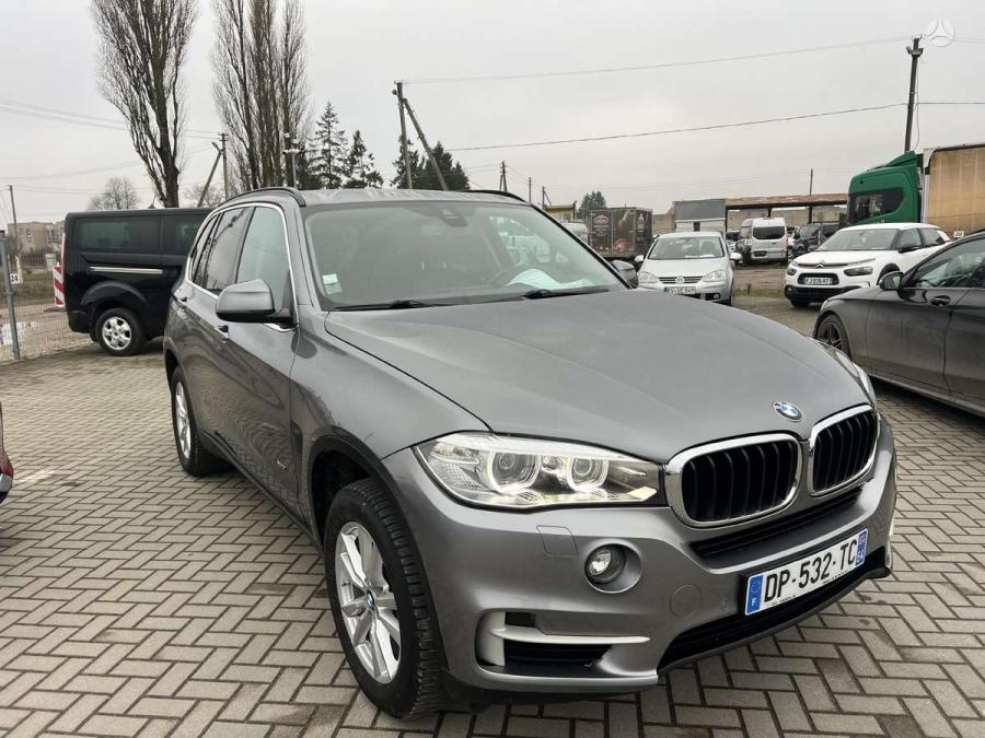 Grey BMW X5 2015 in Taurage, with an engine capacity of 2.00 L and mileage of 194 thousand km for 15800 €, photo 5 on AUTOMOTO.COM.LV