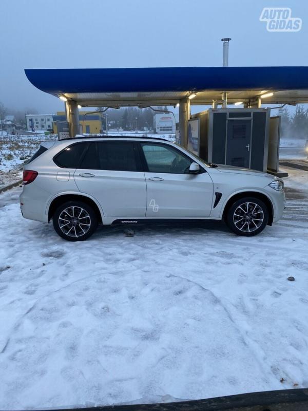 Grey BMW X5 2015 in Raseiniai, with an engine capacity of 3.00 L and mileage of 173 thousand km for 19000 €, photo 4 on AUTOMOTO.COM.LV