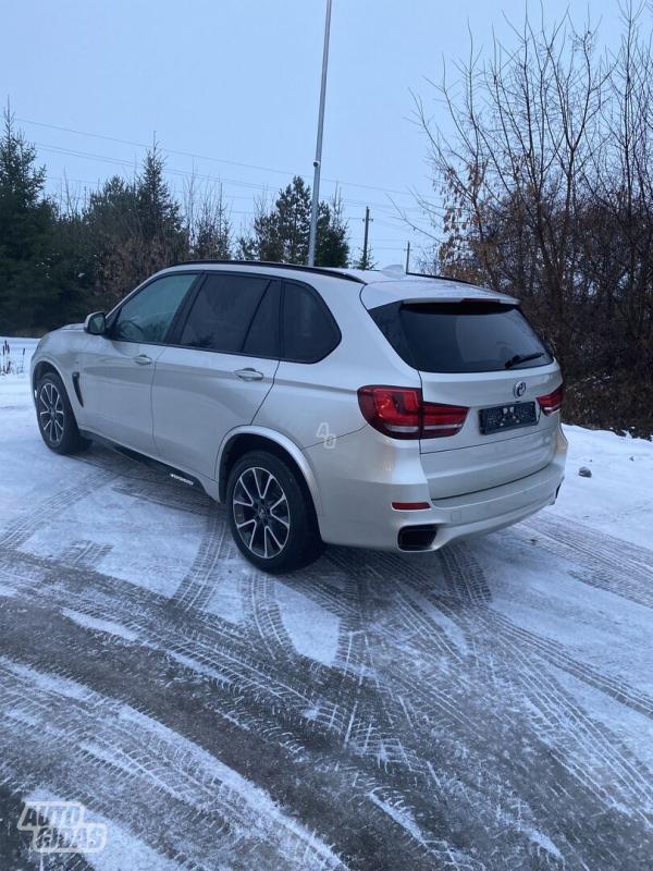 Grey BMW X5 2015 in Raseiniai, with an engine capacity of 3.00 L and mileage of 173 thousand km for 19000 €, photo 6 on AUTOMOTO.COM.LV