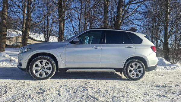 Grey BMW X5 2015 in Klaipeda, with an engine capacity of 2.00 L and mileage of 135 thousand km for 17700 €, photo 6 on AUTOMOTO.COM.LV