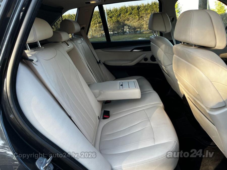 Grey BMW X5 2015 in Tallinn, with an engine capacity of 2.00 L and mileage of 244 thousand km for 17900 €, photo 11 on AUTOMOTO.COM.LV