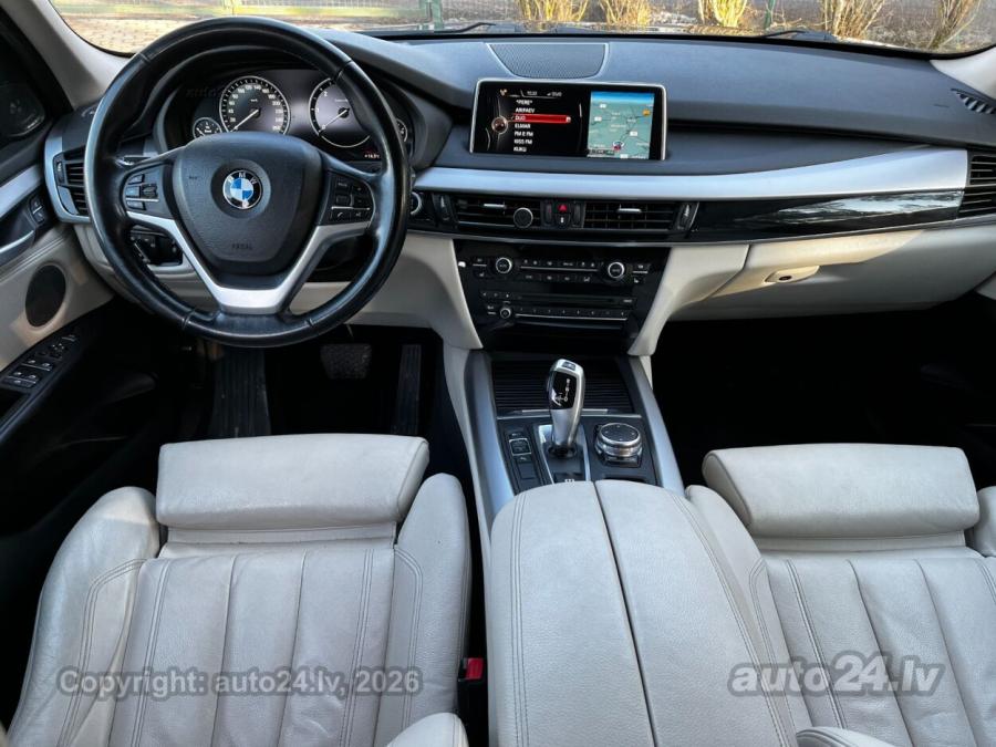 Grey BMW X5 2015 in Tallinn, with an engine capacity of 2.00 L and mileage of 244 thousand km for 17900 €, photo 13 on AUTOMOTO.COM.LV
