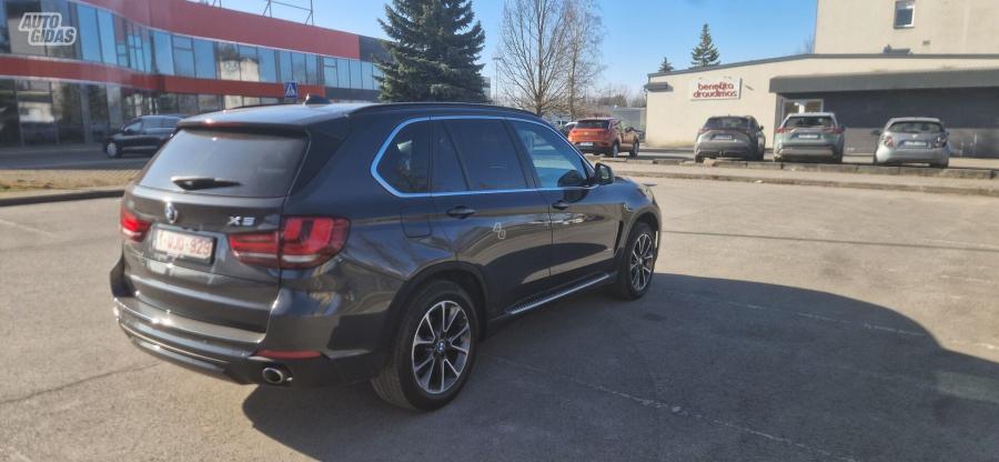 Grey BMW X5 2015 in Siauliai, with an engine capacity of 3.00 L and mileage of 247 thousand km for 13450 €, photo 13 on AUTOMOTO.COM.LV