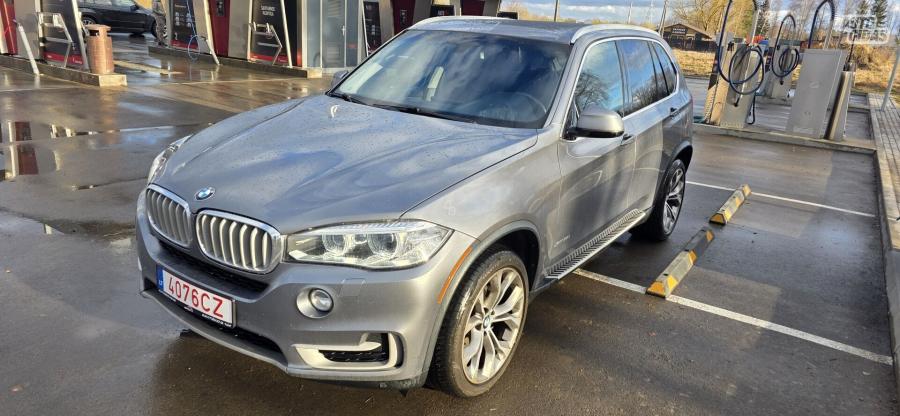 Grey BMW X5 2015 in Panevezys, with an engine capacity of 3.00 L and mileage of 303 thousand km for 14000 €, photo 3 on AUTOMOTO.COM.LV