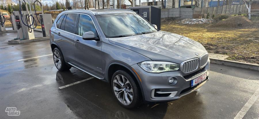 Grey BMW X5 2015 in Panevezys, with an engine capacity of 3.00 L and mileage of 303 thousand km for 14000 €, photo 4 on AUTOMOTO.COM.LV