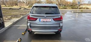 Grey BMW X5 2015 in Panevezys, with an engine capacity of 3.00 L and mileage of 303 thousand km for 14000 €, photo 5 on AUTOMOTO.COM.LV