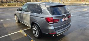 Grey BMW X5 2015 in Panevezys, with an engine capacity of 3.00 L and mileage of 303 thousand km for 14000 €, photo 6 on AUTOMOTO.COM.LV