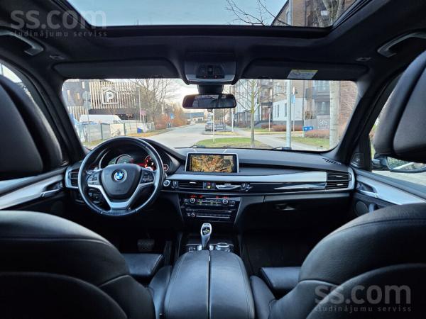 Grey BMW X5 2015 in Riga, with an engine capacity of 3.00 L and mileage of 244 thousand km for 23500 €, photo 6 on AUTOMOTO.COM.LV