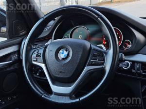 Grey BMW X5 2015 in Riga, with an engine capacity of 3.00 L and mileage of 244 thousand km for 23500 €, photo 12 on AUTOMOTO.COM.LV