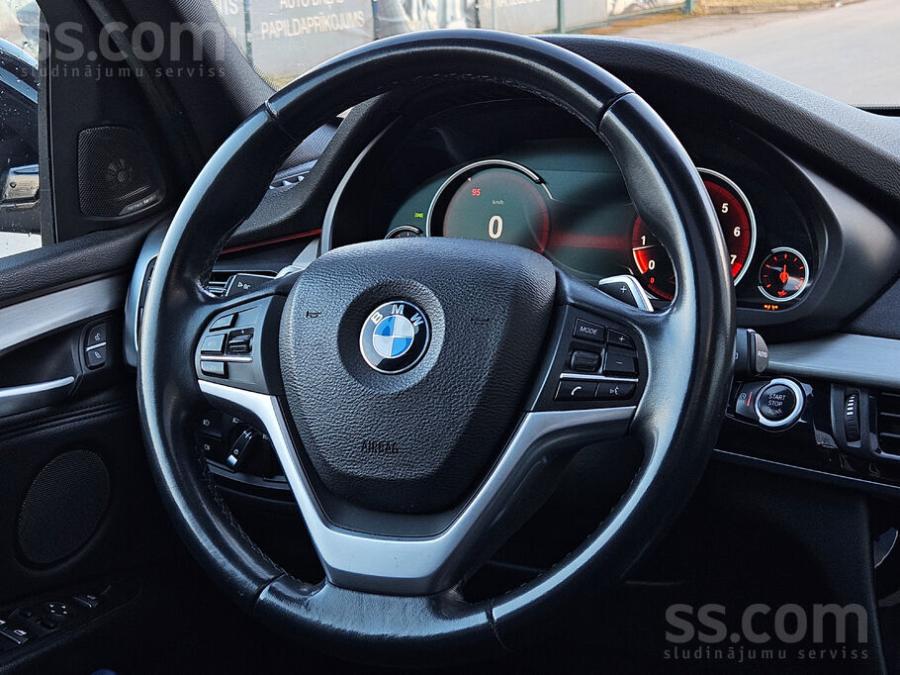 Grey BMW X5 2015 in Riga, with an engine capacity of 3.00 L and mileage of 244 thousand km for 23500 €, photo 12 on AUTOMOTO.COM.LV