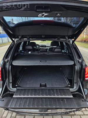 Grey BMW X5 2015 in Riga, with an engine capacity of 3.00 L and mileage of 244 thousand km for 23500 €, photo 19 on AUTOMOTO.COM.LV
