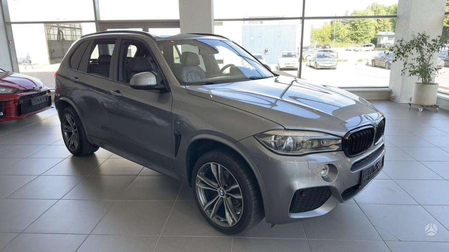 Grey BMW X5 2015 in Marijampole, with an engine capacity of 2.99 L and mileage of 247 thousand km for 23999 €, photo 14 on AUTOMOTO.COM.LV