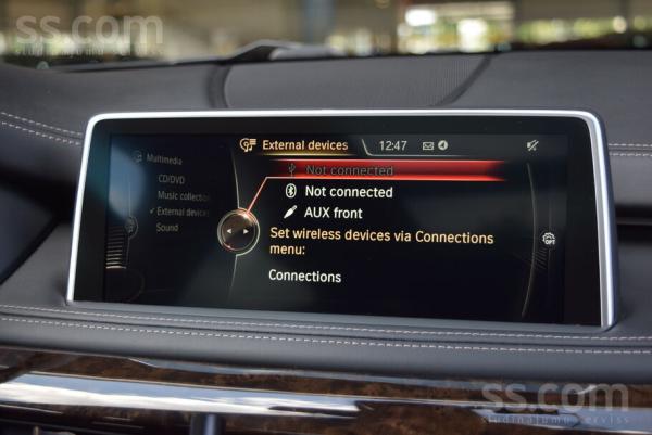 Grey BMW X5 2015 in Riga, with an engine capacity of 3.00 L and mileage of 181 thousand km for 19900 €, photo 6 on AUTOMOTO.COM.LV
